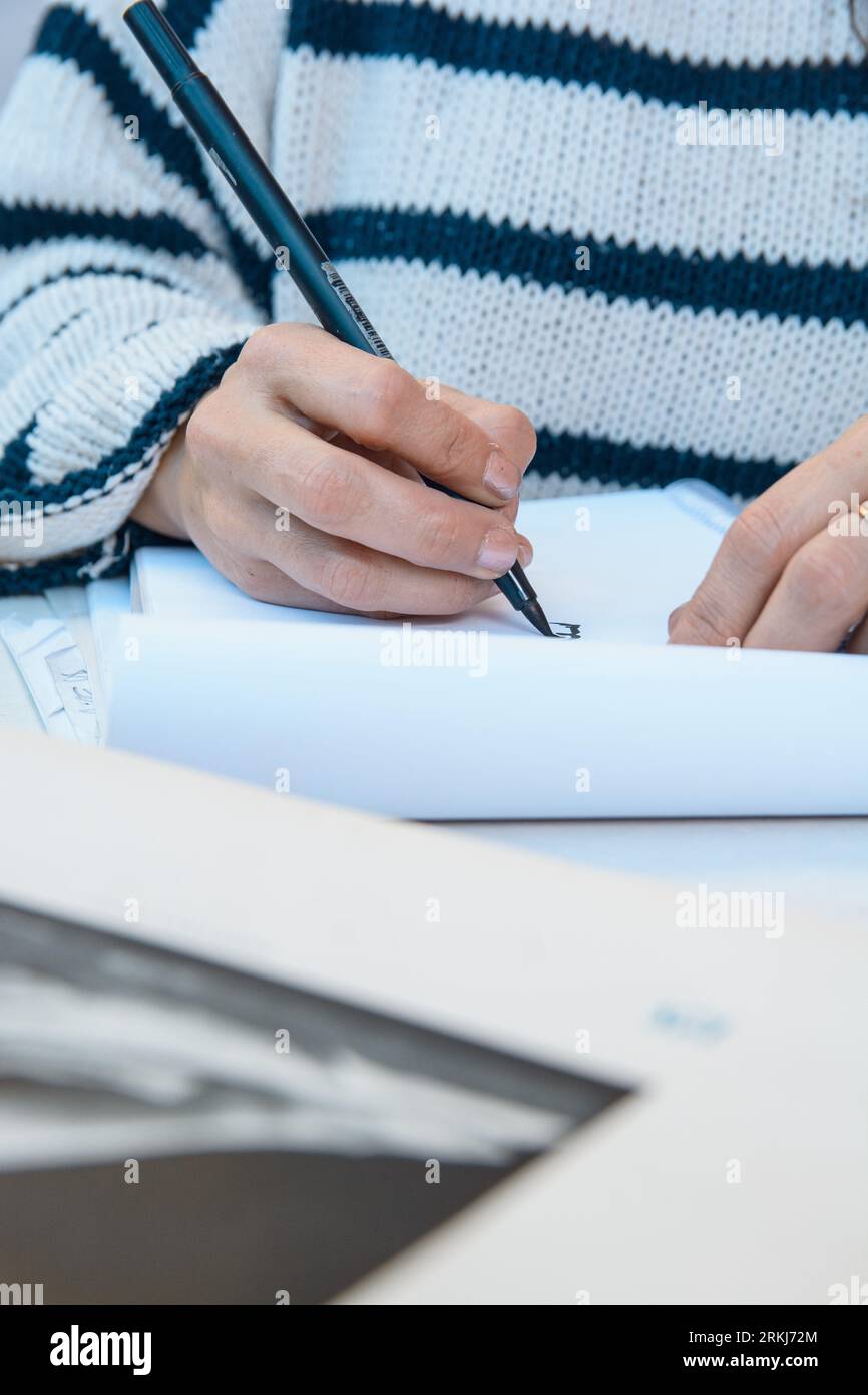 Vertical front view of caucasian female hands of unrecognizable woman ...