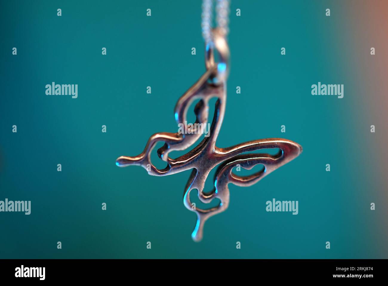 A closeup of a butterfly necklace Stock Photo - Alamy