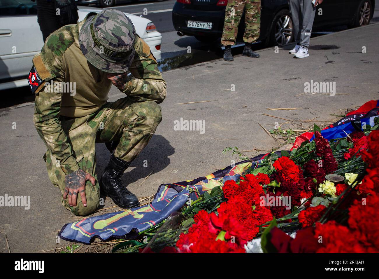 A member of the Wagner group honors the memory of Yevgeny Prigozhin at ...