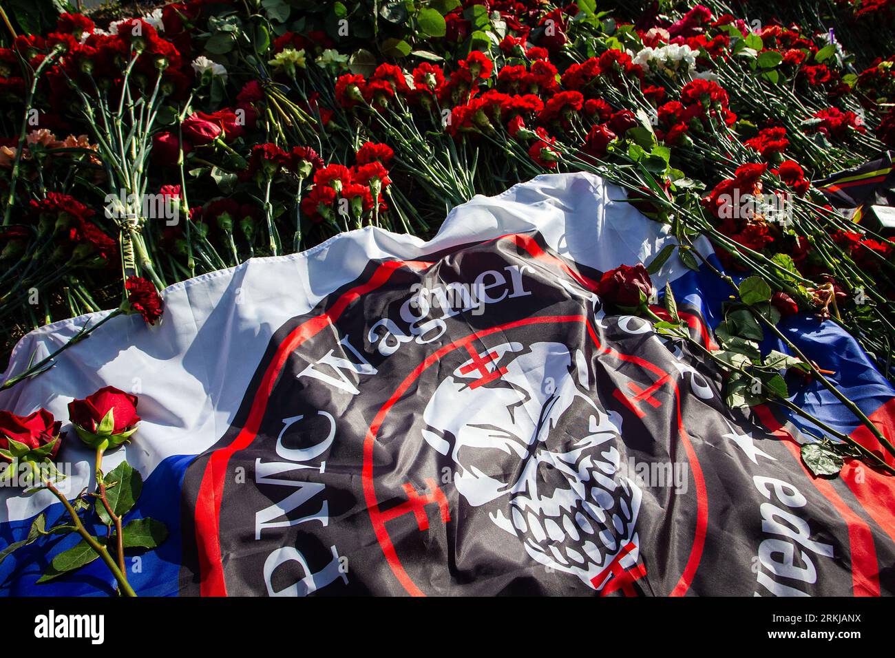 Flowers laid in memory of Yevgeny Prigozhin at a spontaneous memorial ...