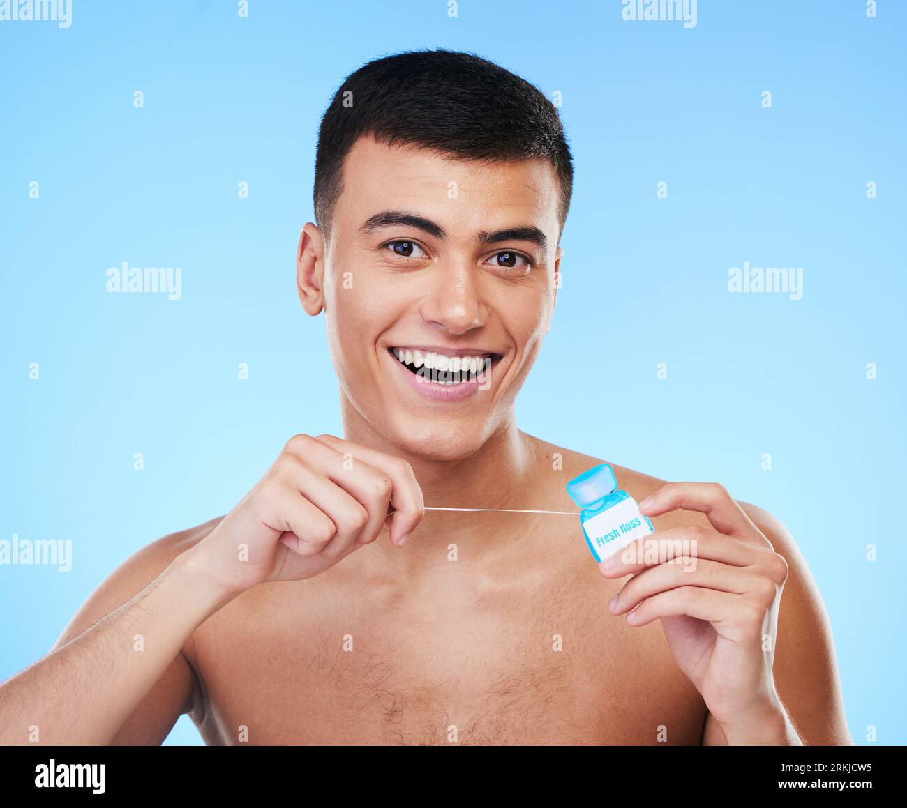 Studio man happy flossing hi-res stock photography and images - Alamy