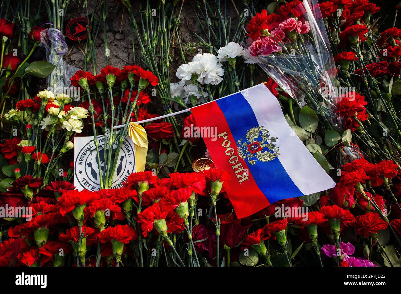 Flowers laid in memory of Yevgeny Prigozhin at a spontaneous memorial ...