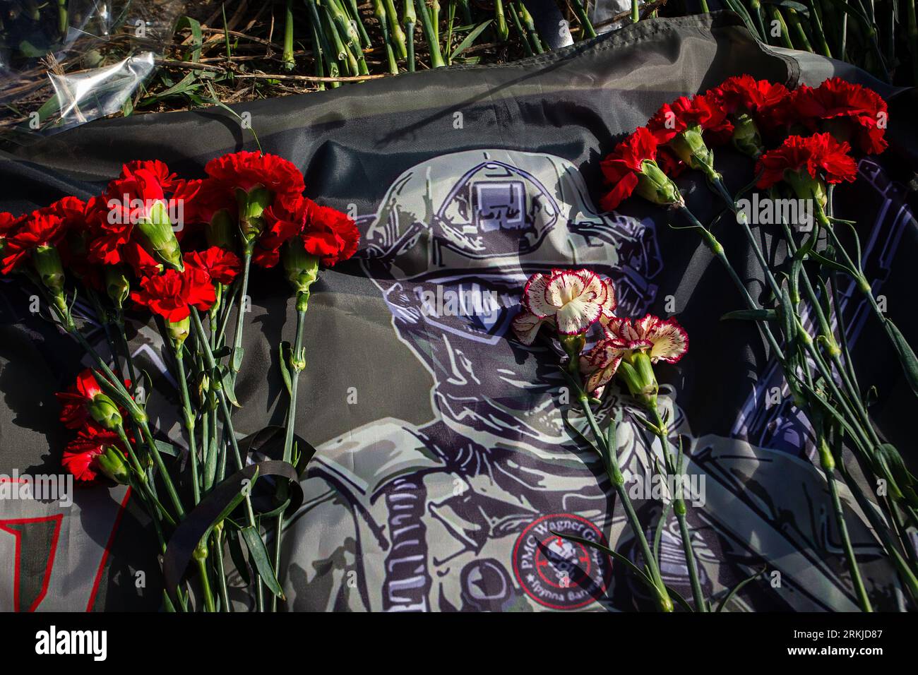 Flowers laid in memory of Yevgeny Prigozhin at a spontaneous memorial ...