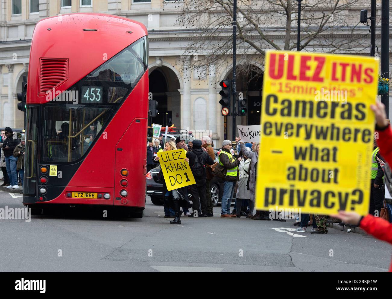 Participants gather with placards during a protest against the ...