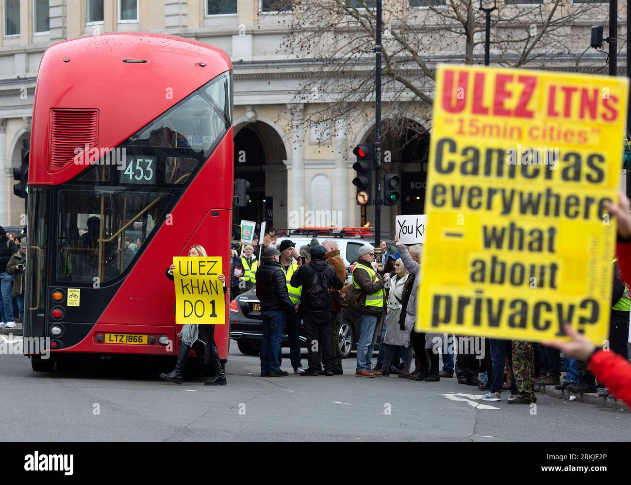 Participants gather with placards during a protest against the ...