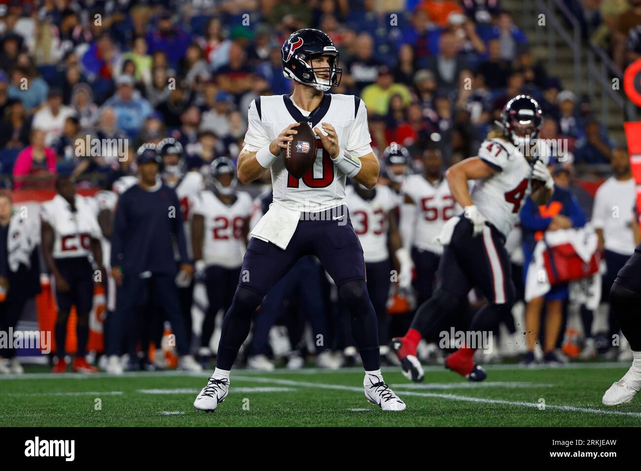 Houston Texans quarterback Davis Mills drops back to pass against the ...
