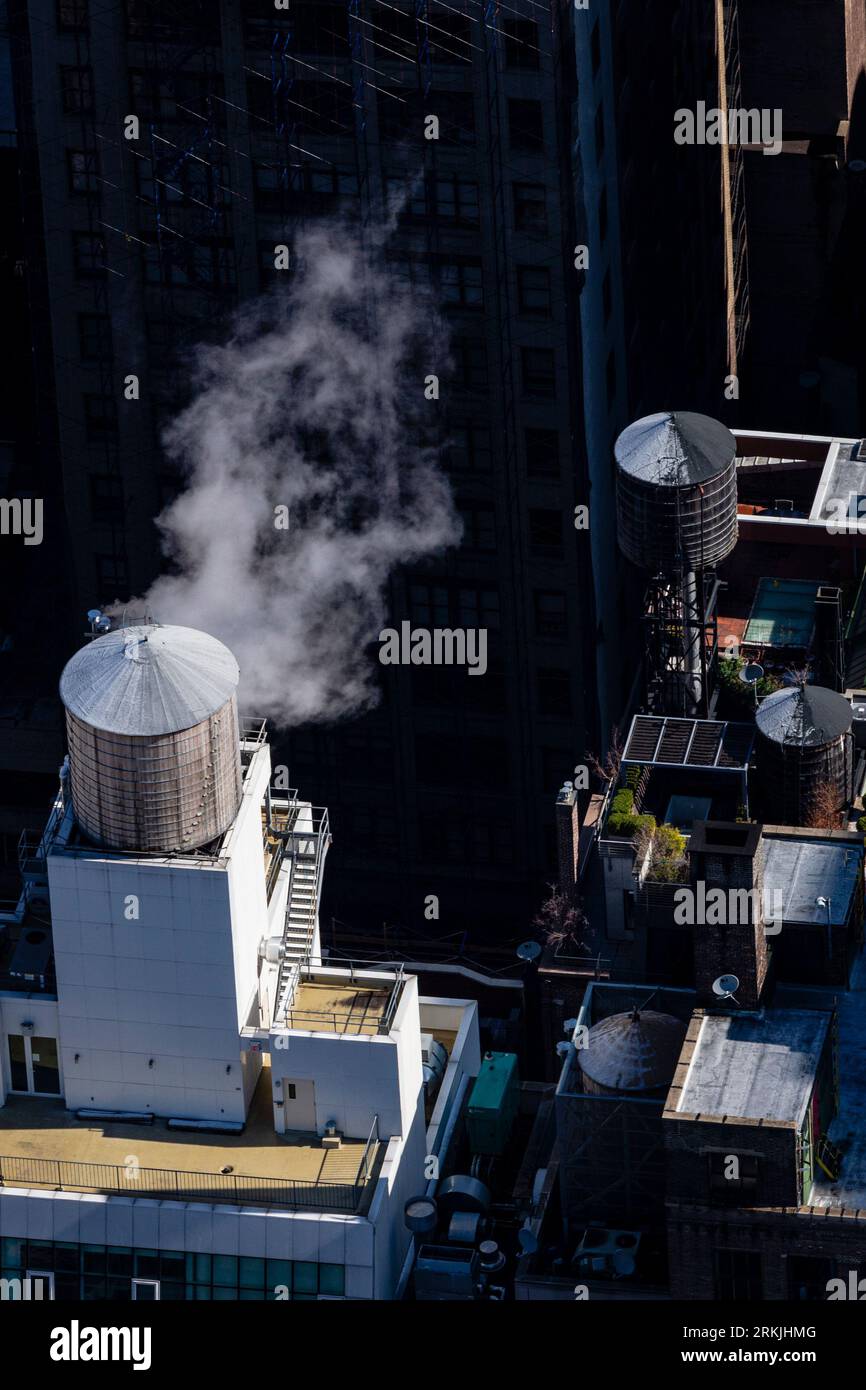Smoke above the roofs hi-res stock photography and images - Alamy