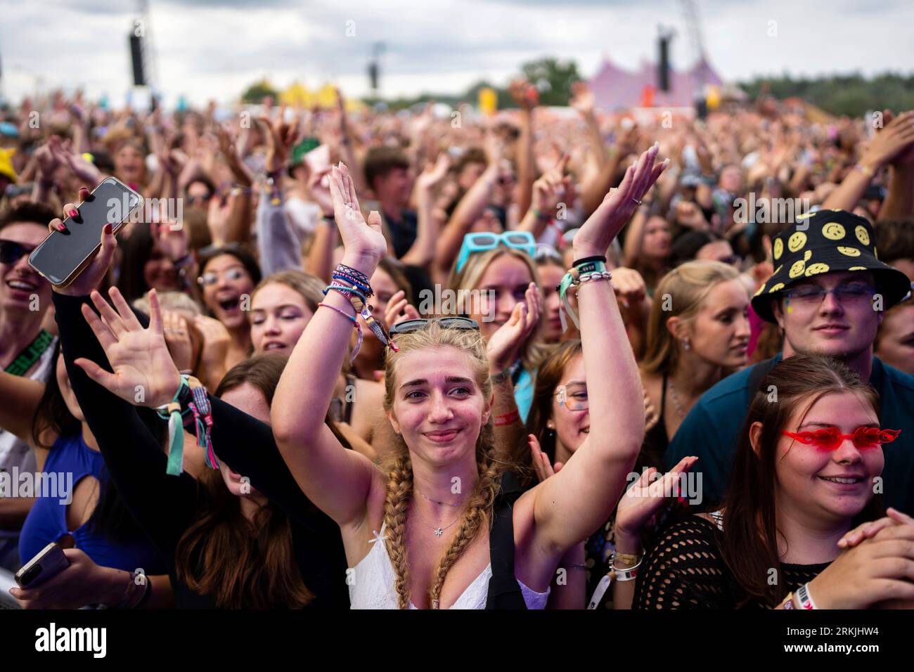 Festival goers at the Reading Music Festival, England, Friday, Aug. 25 ...