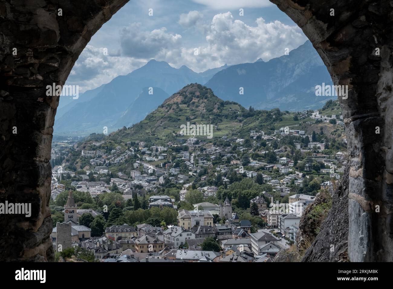 Beautiful landscape of Sion through the castle door in Switzerland ...