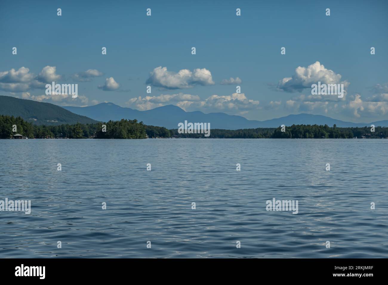 A picturesque view of New Hampshire's Lake Winnipesaukee with the ...