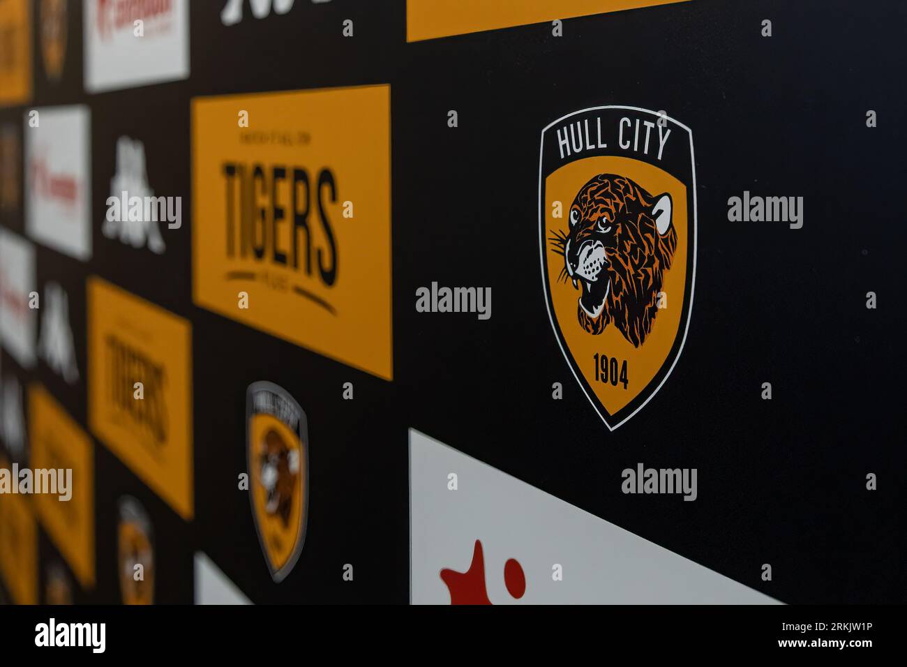 Hull, UK. 25th Aug, 2023. Hull City badge on the sponsors board in the ...
