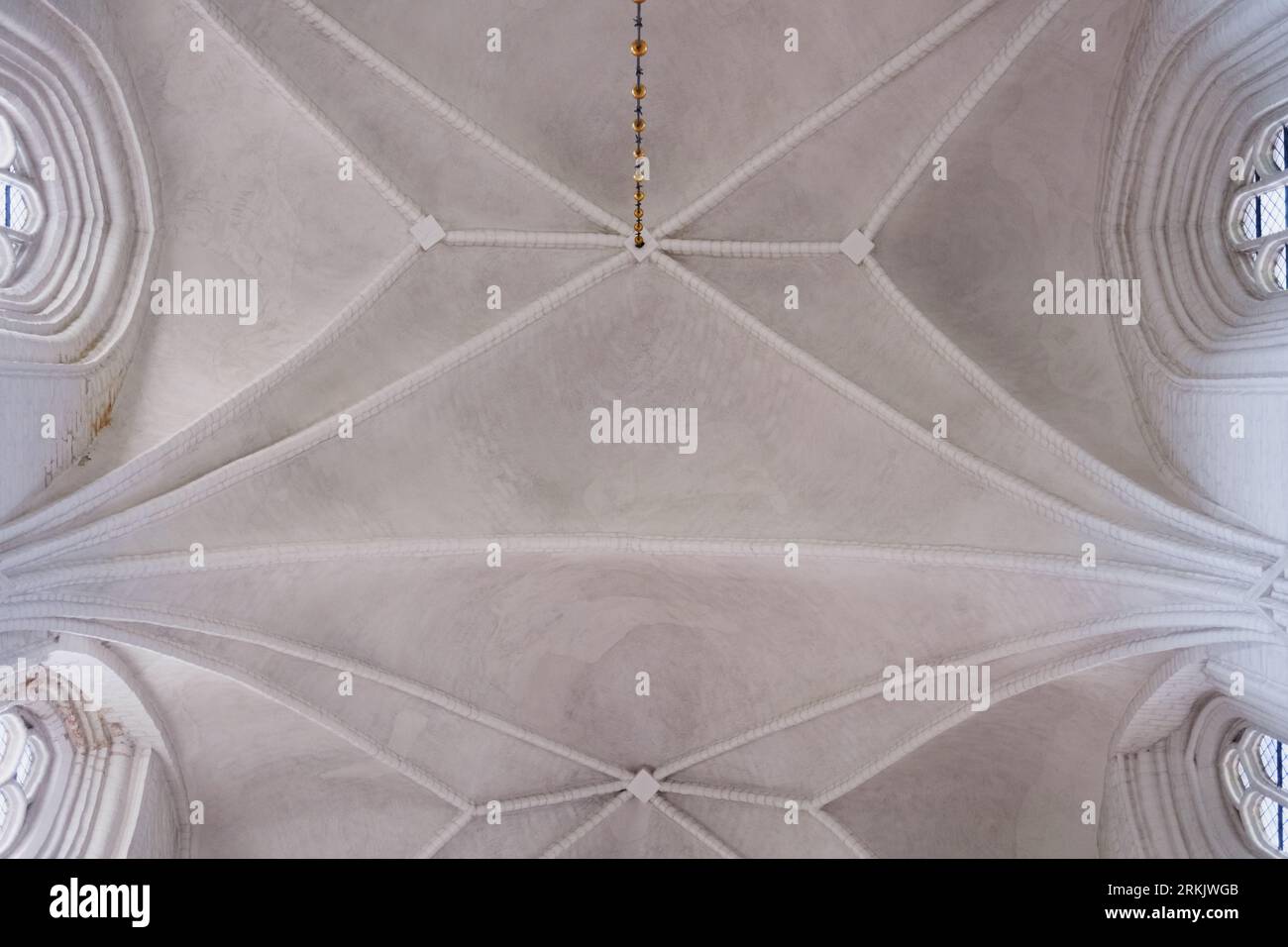 Interior ceiling of a church, simple in white, the ribs for unloading ...