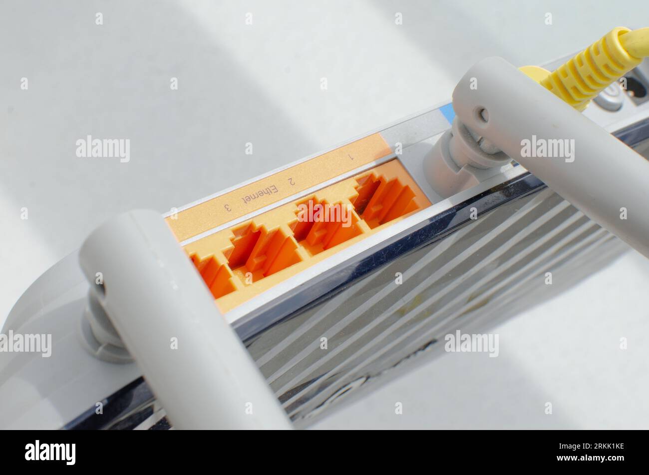 Close-up detail of a modern Wi-Fi router, with multiple inputs and ... Close-up detail of a modern Wi-Fi router, with multiple inputs and ...