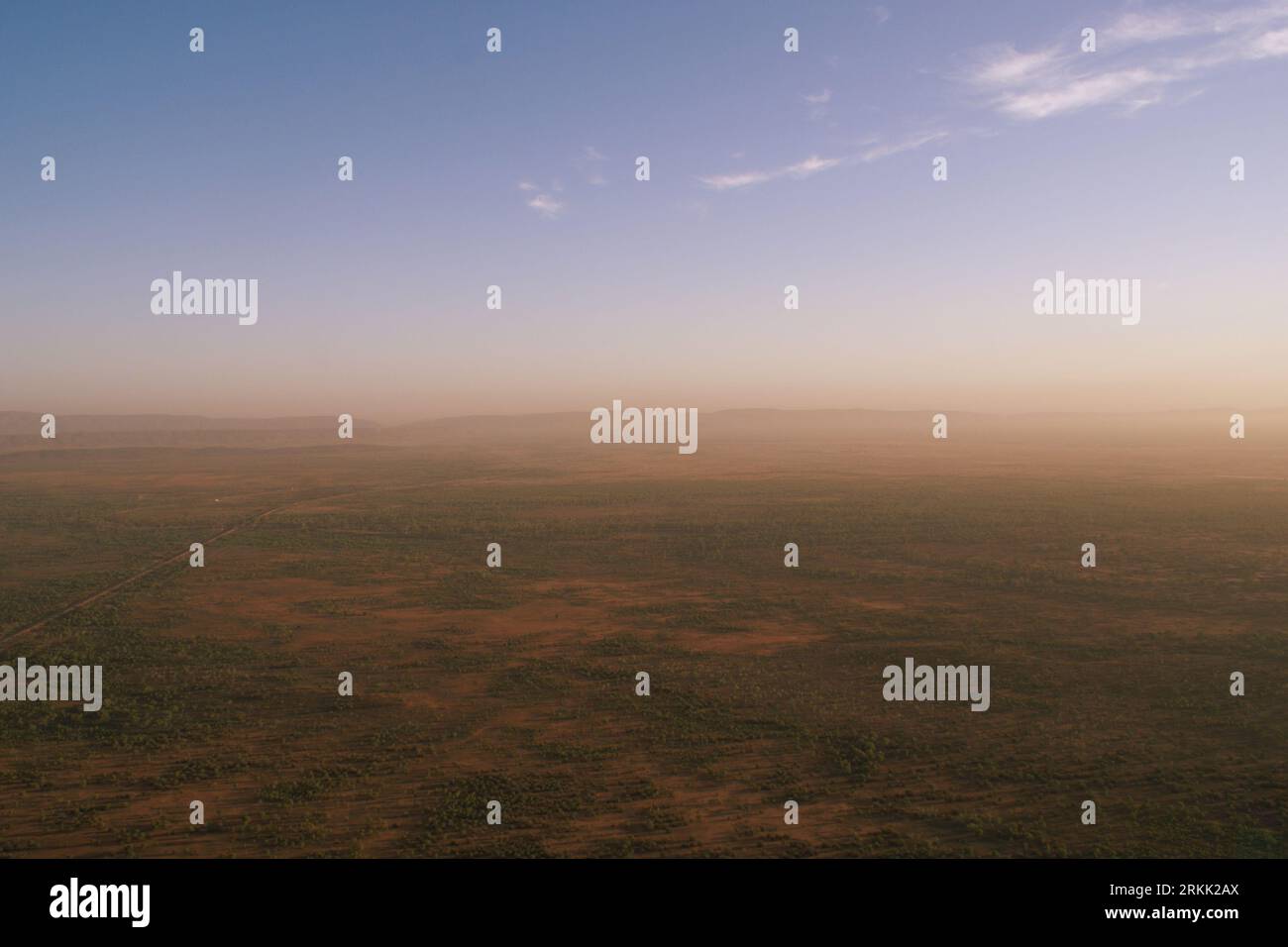Aerial view of the Australian outback with the West MacDonnell Ranges ...