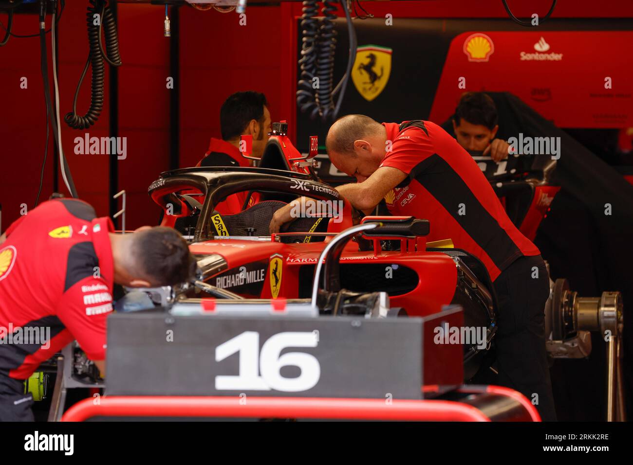 ZANDVOORT, NETHERLANDS - AUGUST 24: Mechanics working at Charles Leclerc car of Scuderia Ferrari ...