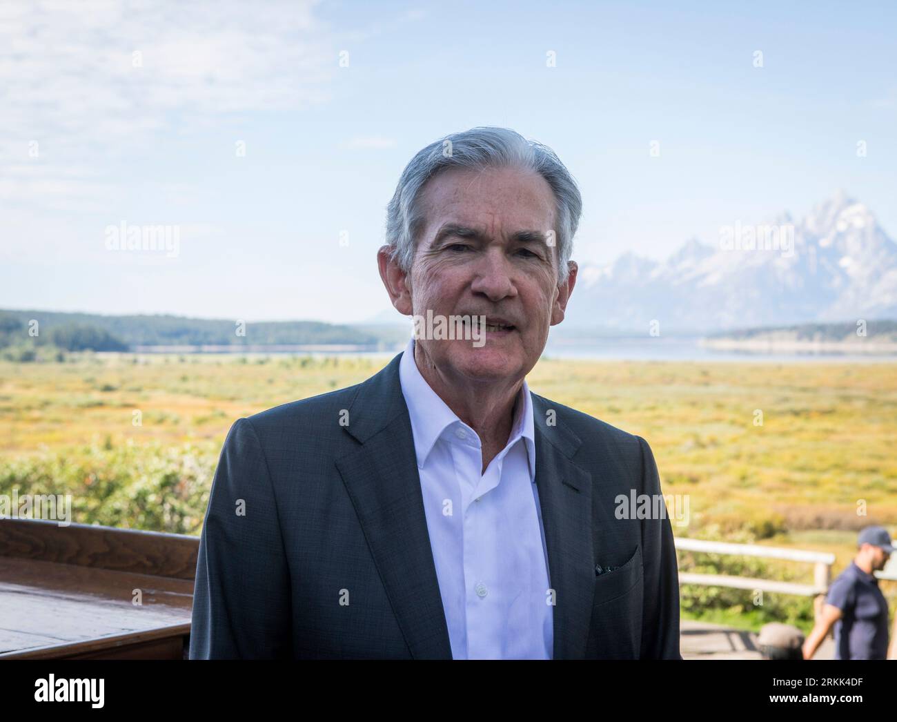 Federal Reserve Chairman Jerome Powell takes a break outside of Jackson ...