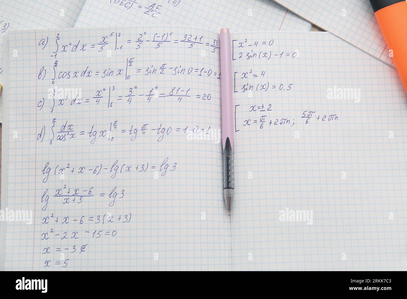 Open copybook with math formulas and pen as background, closeup Stock ...