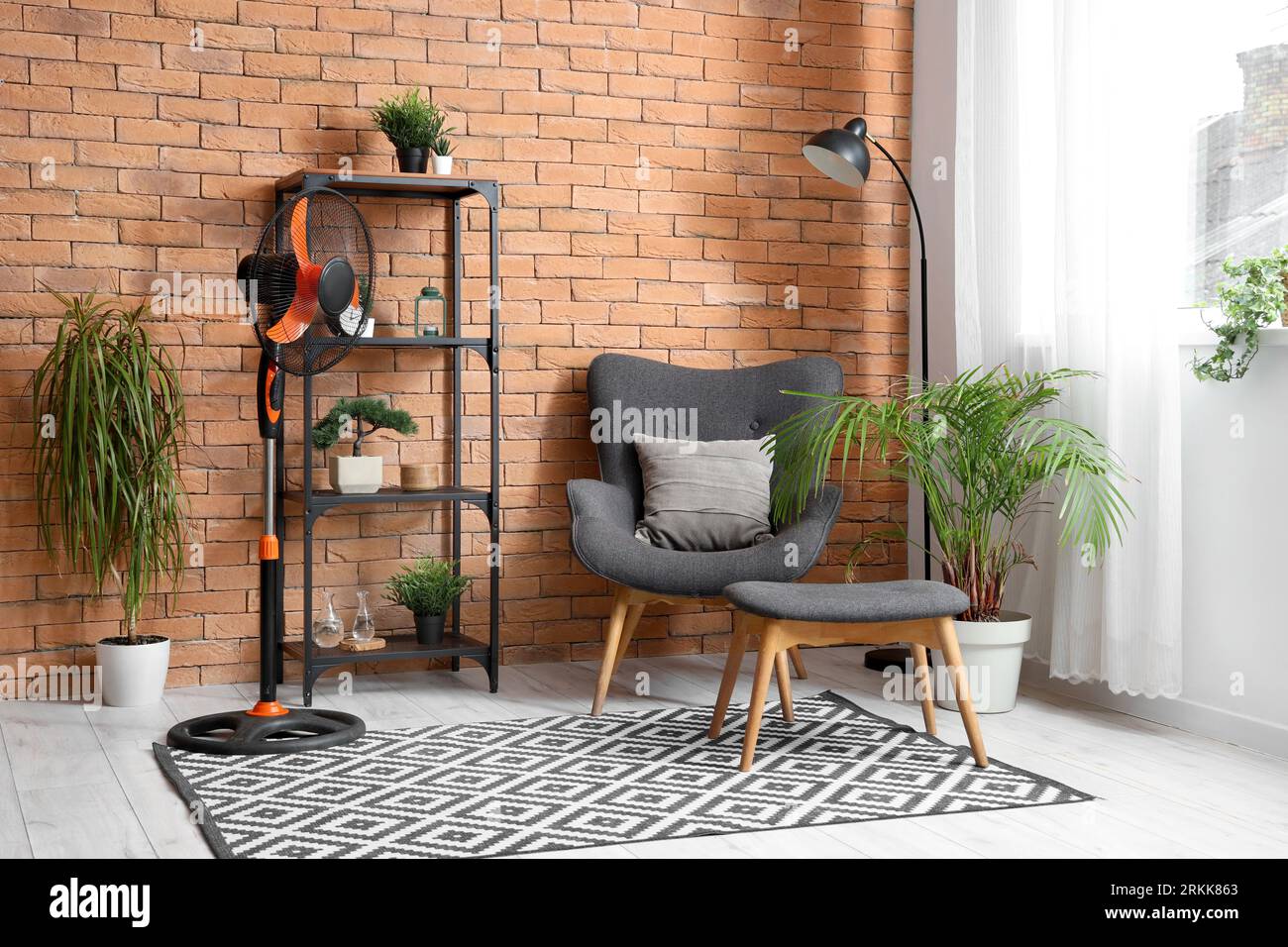 Floor fan in interior of stylish living room Stock Photo - Alamy