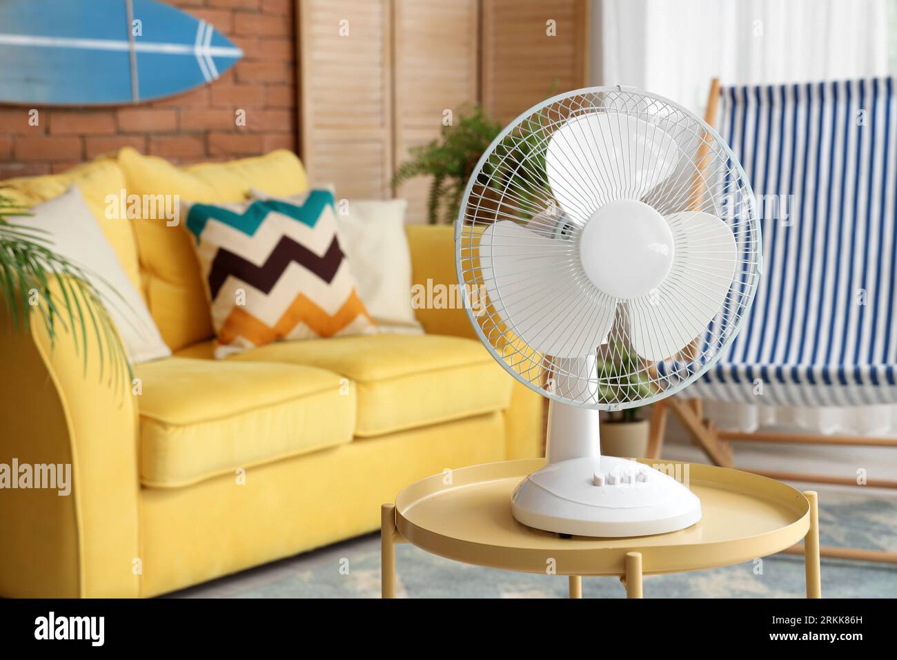 Yellow desk fan is spinning hi-res stock photography and images - Alamy