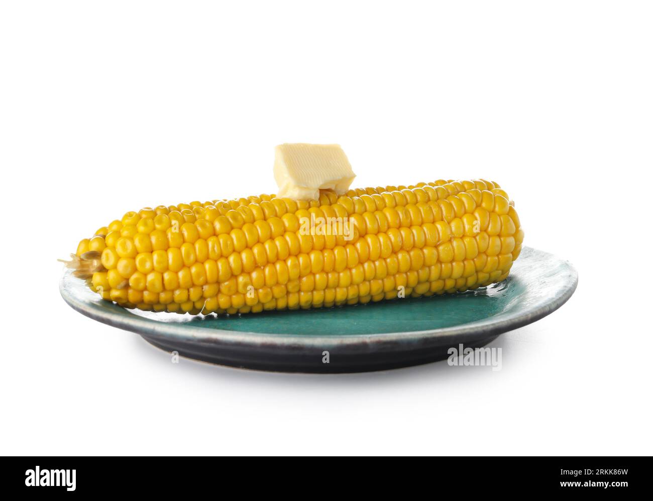 Plate of boiled corn cob with butter on white background Stock Photo ...