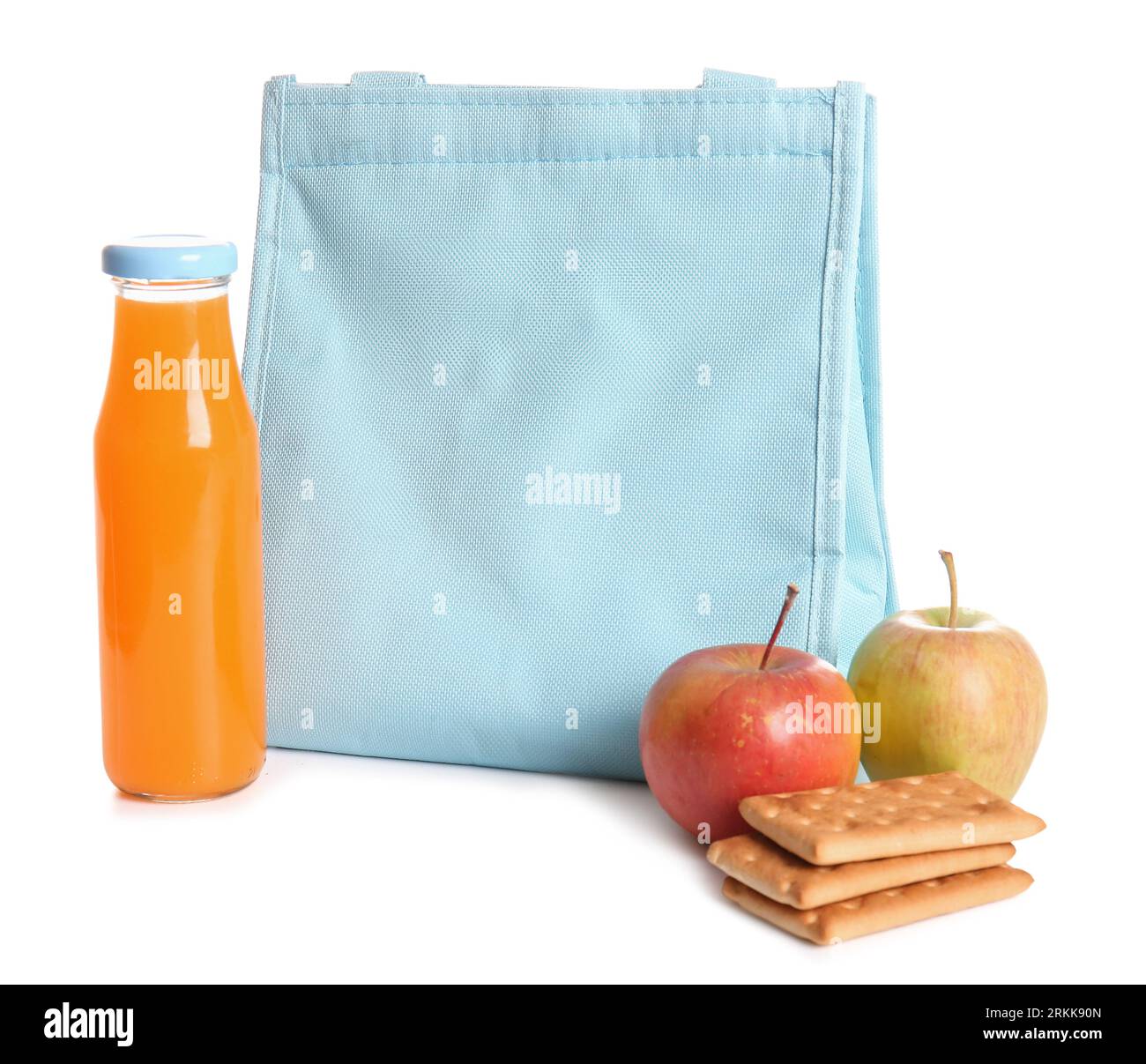 Lunch box bag with apples, crackers and bottle of juice isolated on ...