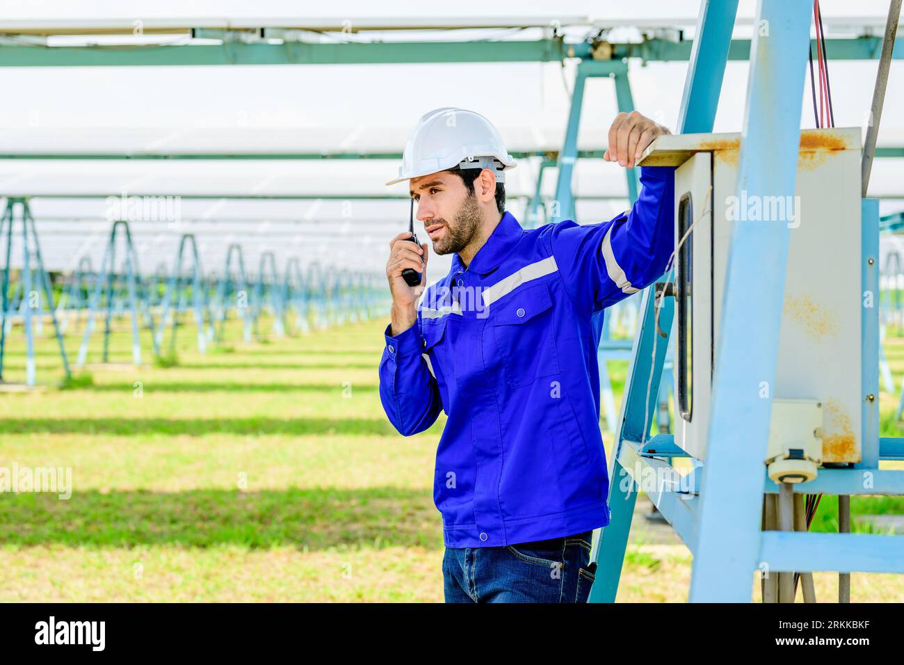 Technicians workers installing solar panels at solar cell farm Stock ...