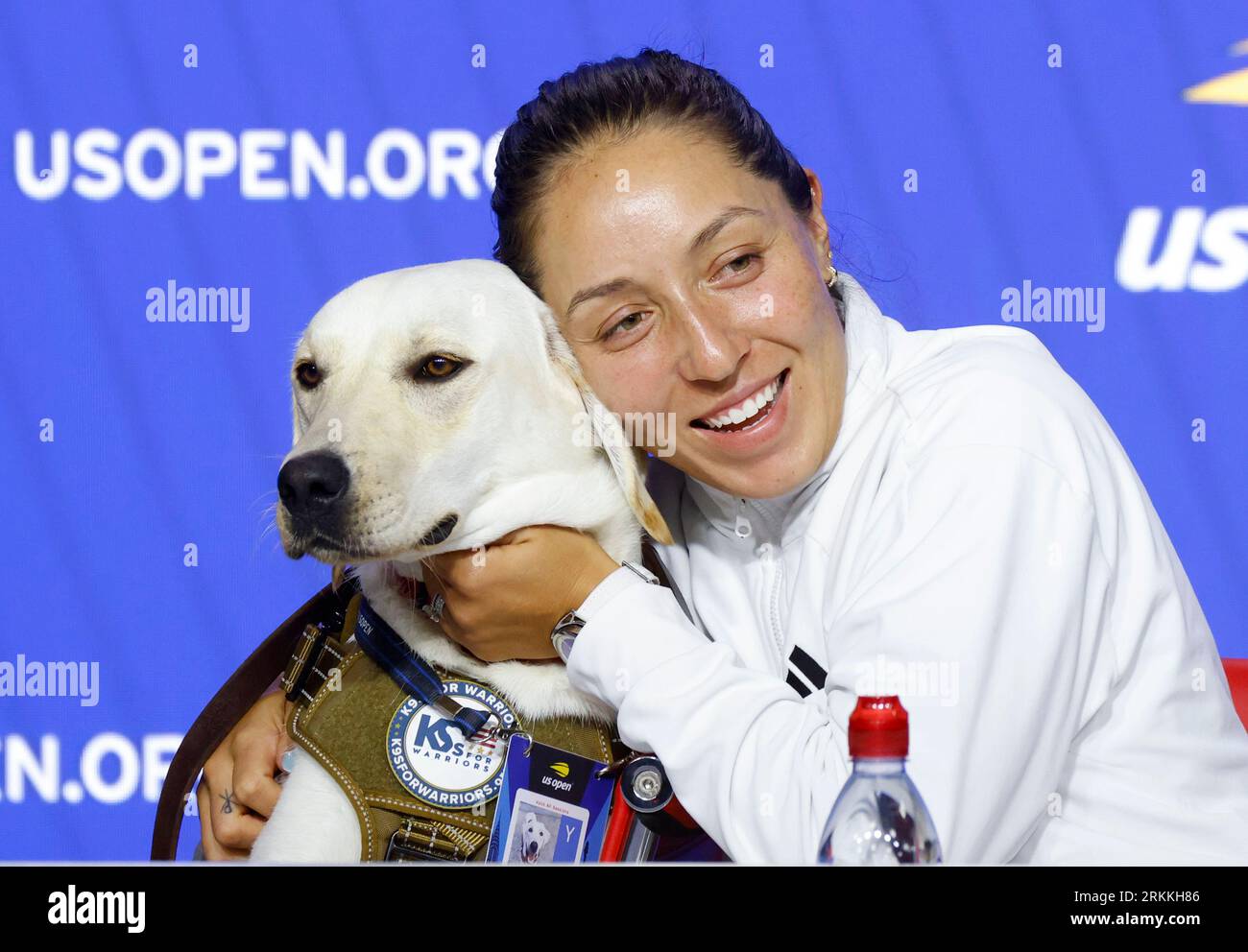 Flushing Meadow, USA. 25th Aug, 2023. Jessica Pegula holds Ace, a ...
