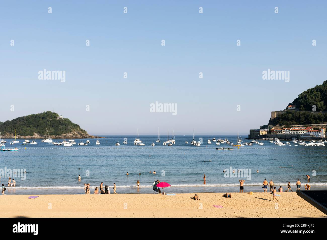 People on La Concha beach in San Sebastian, Spain Stock Photo - Alamy