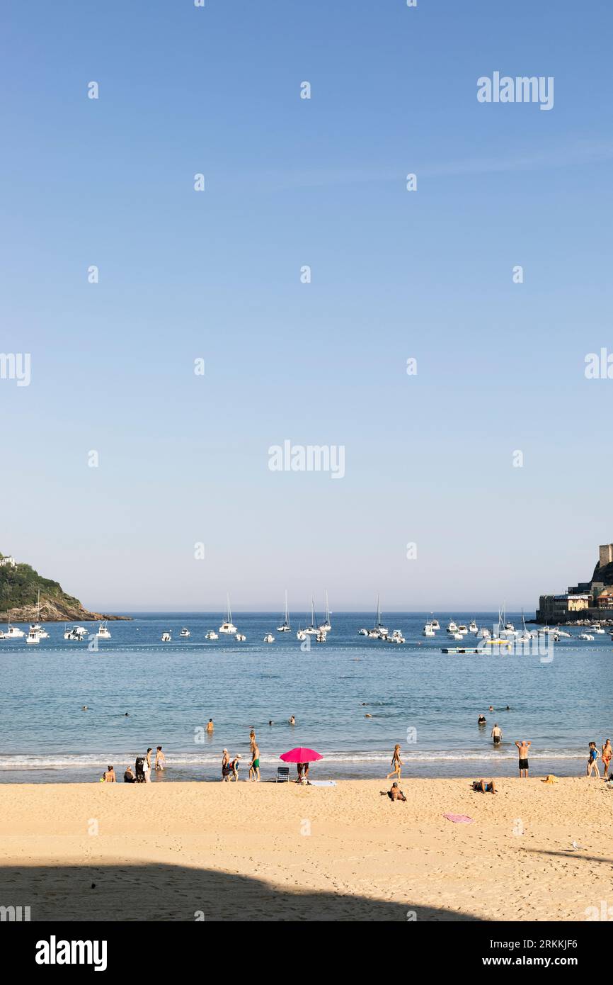 People on La Concha beach in San Sebastian, Spain Stock Photo - Alamy