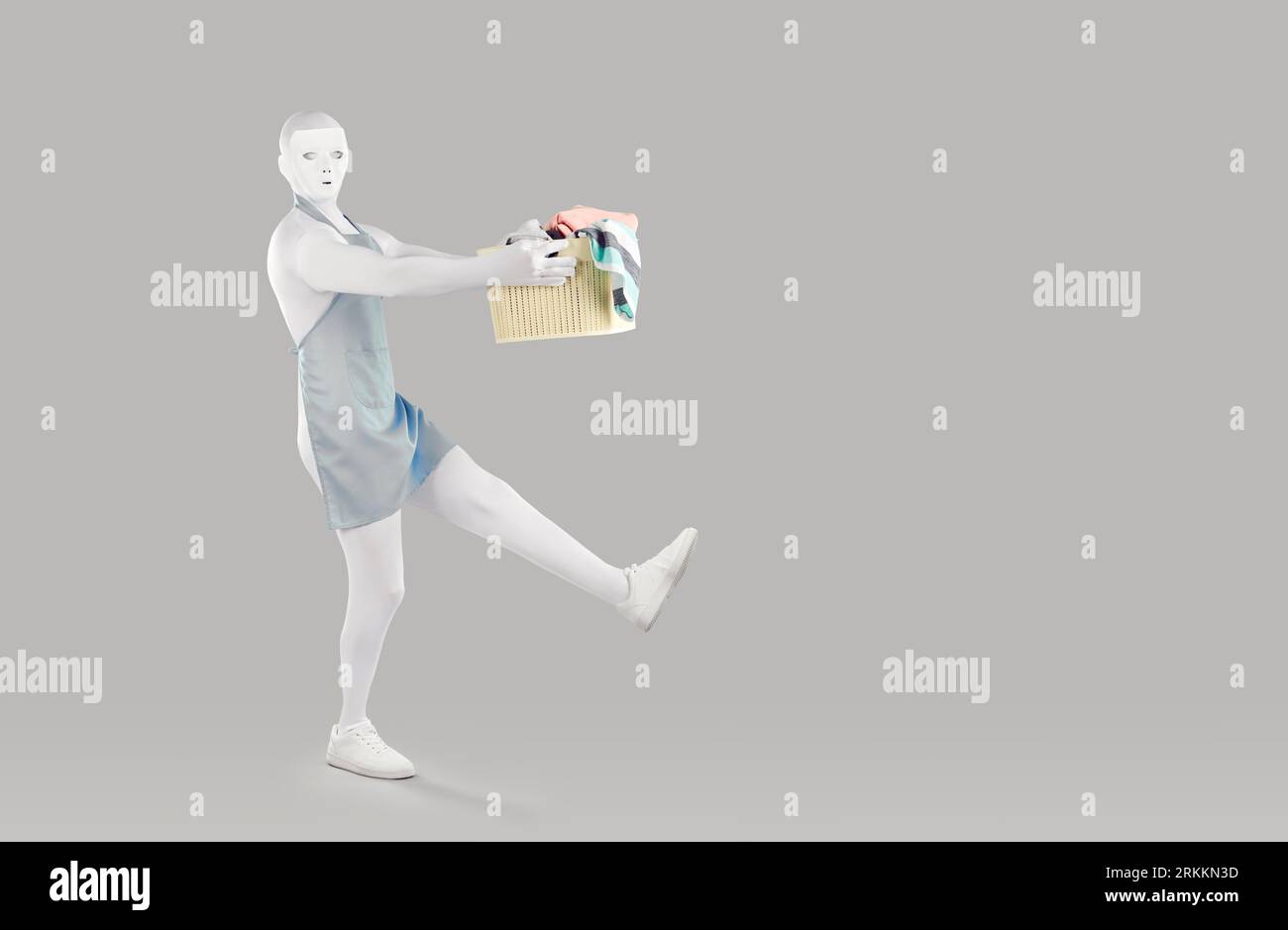 Faceless man in white skinny bodysuit carrying a laundry basket ...