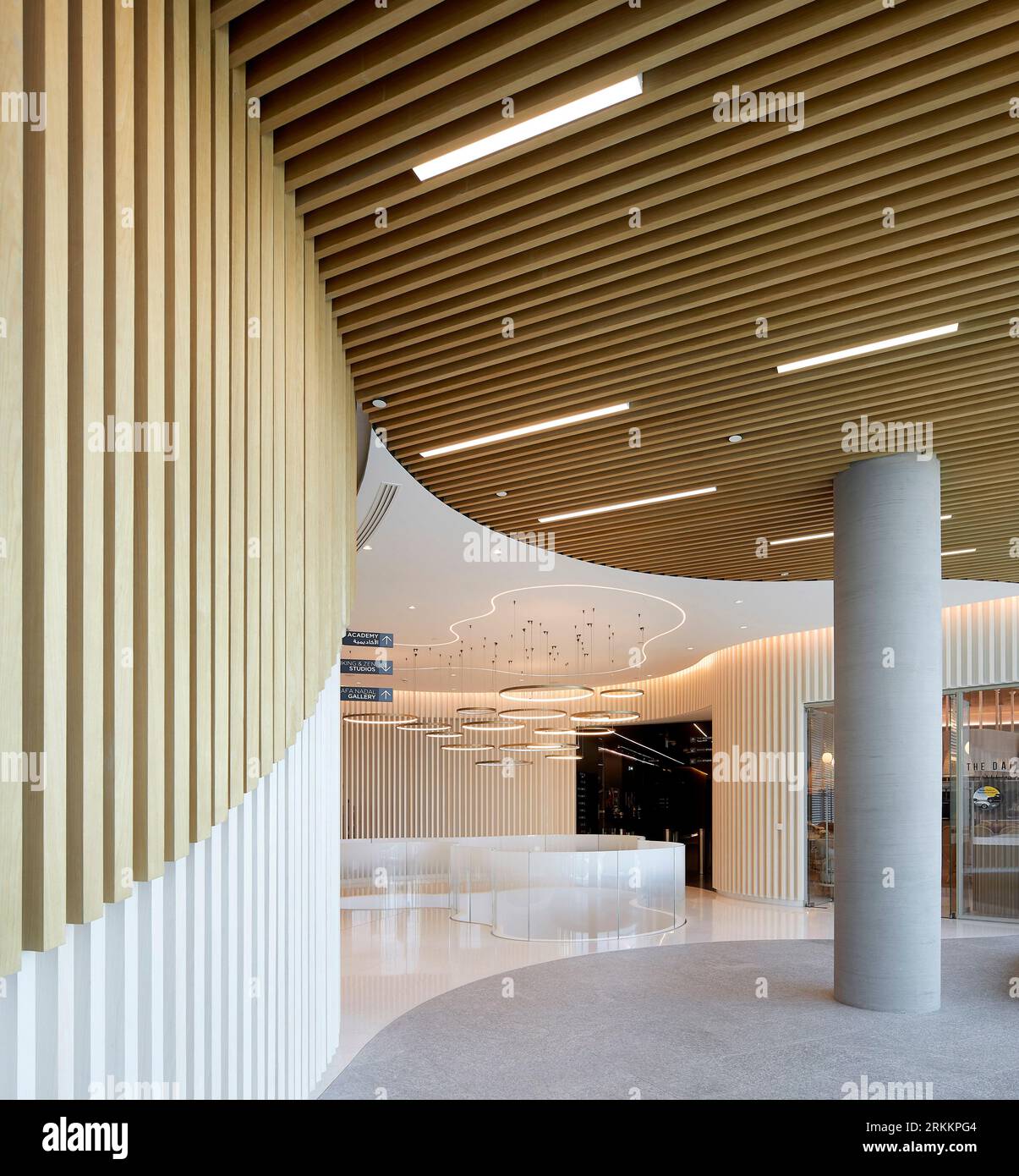 Curved mall interior. 360 Mall, Kuweit City, Kuwait. Architect: CRTKL ...