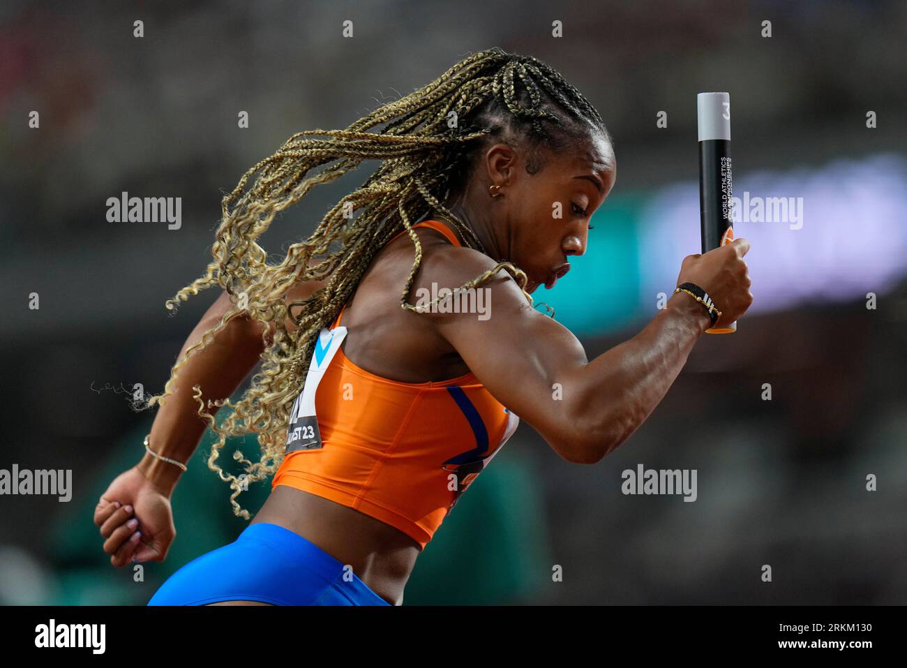 N'Ketia Seedo, of the Netherlands runs the lead leg of a Women's 4x100 ...