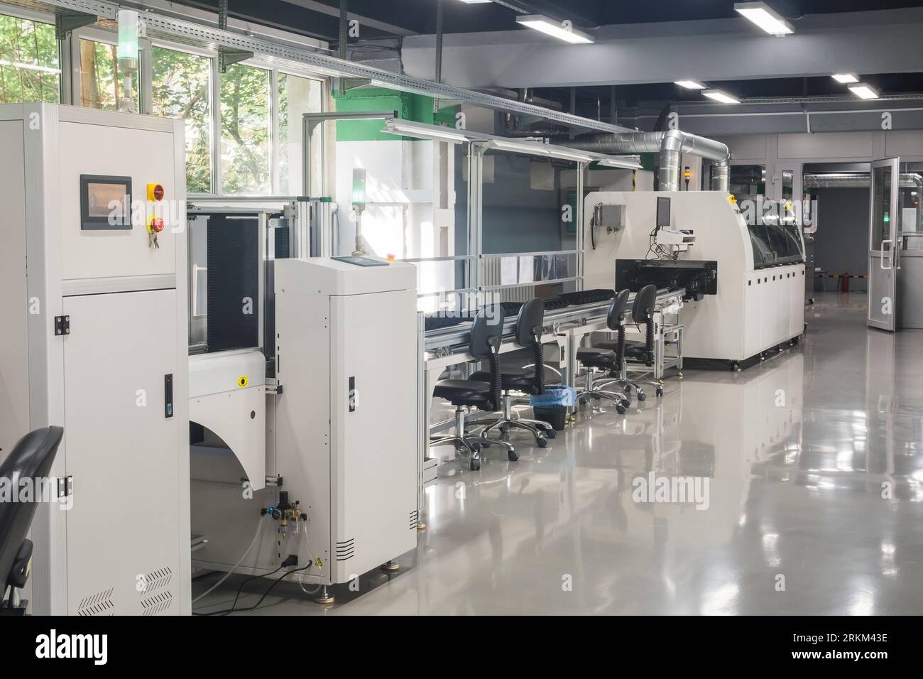 production line for printed circuit board, automatic chip mounter Stock ...