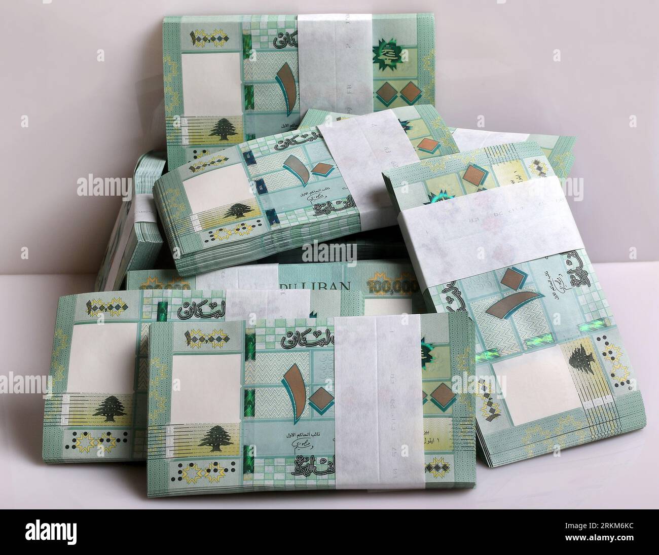 Stacks of Lebanese pounds, 100,000 denomination, symbolizing the ...