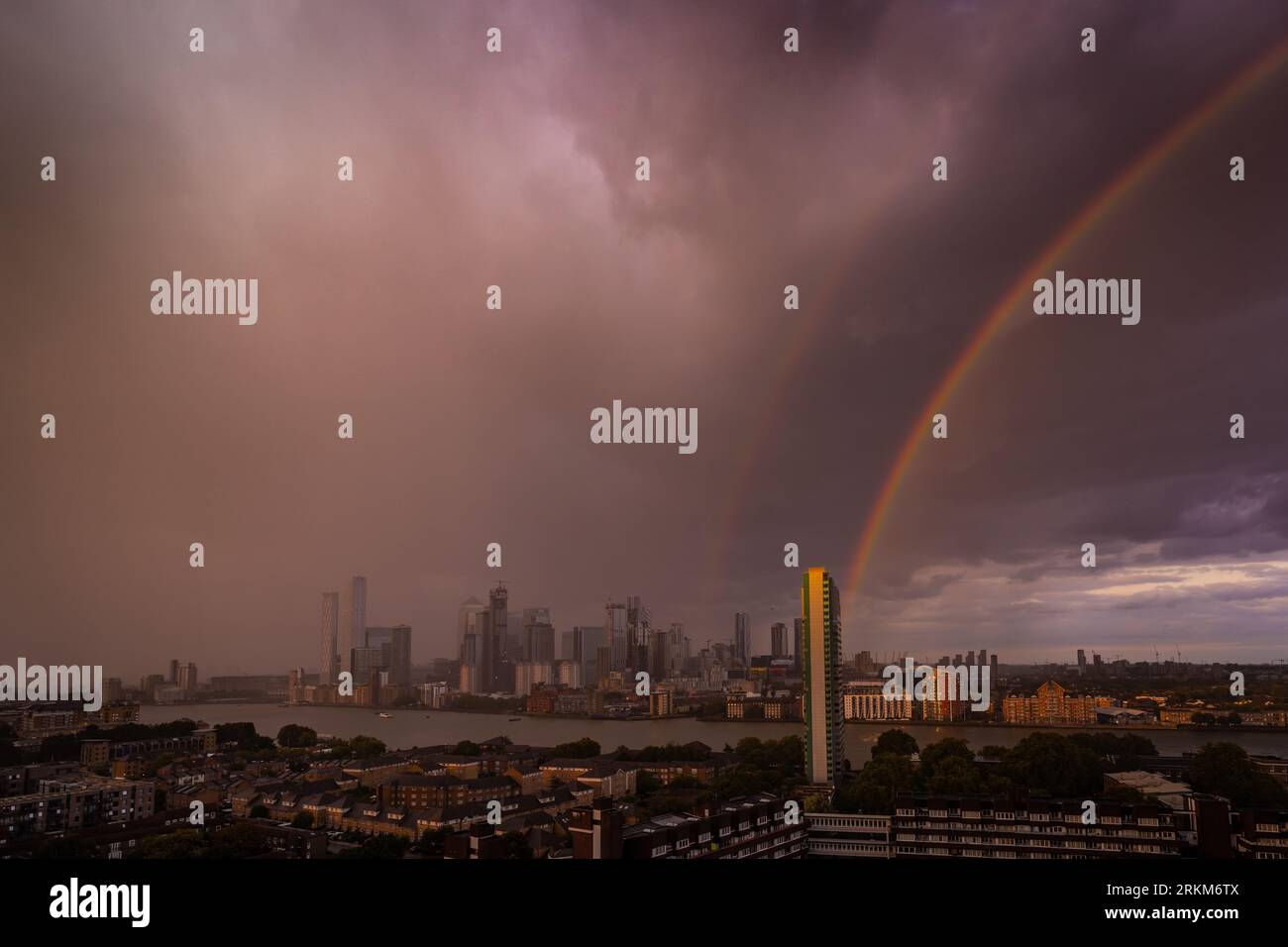 London, UK. 25th August, 2023. UK Weather: A massive sunset rainbow ...