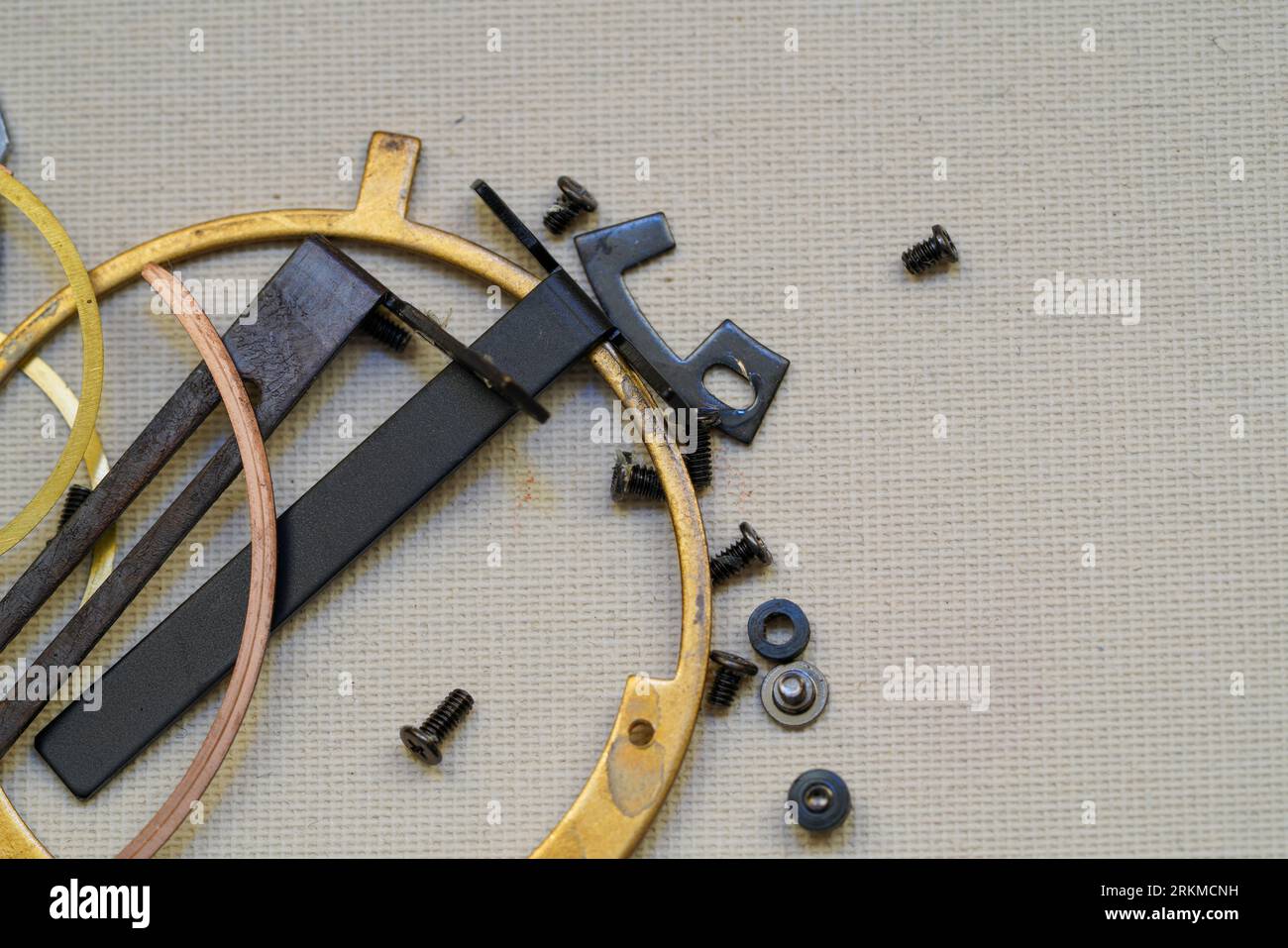 Clean and disassemble the lens for photography into its component parts ...