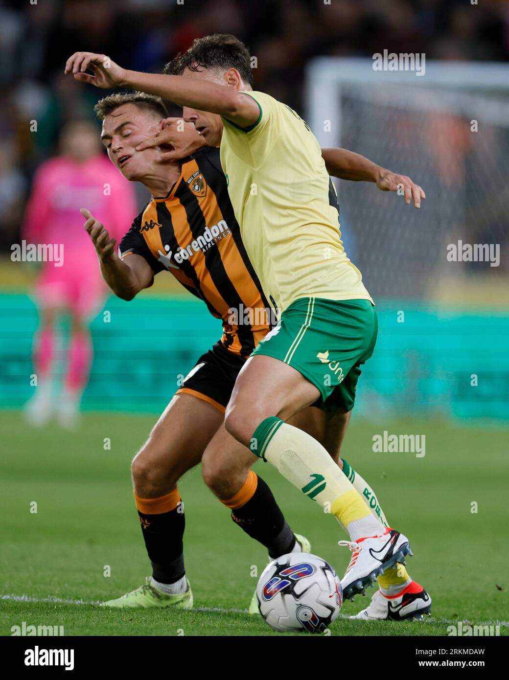 Bristol City's Kal Naismith (right) strikes Hull City's Scott Twine in ...
