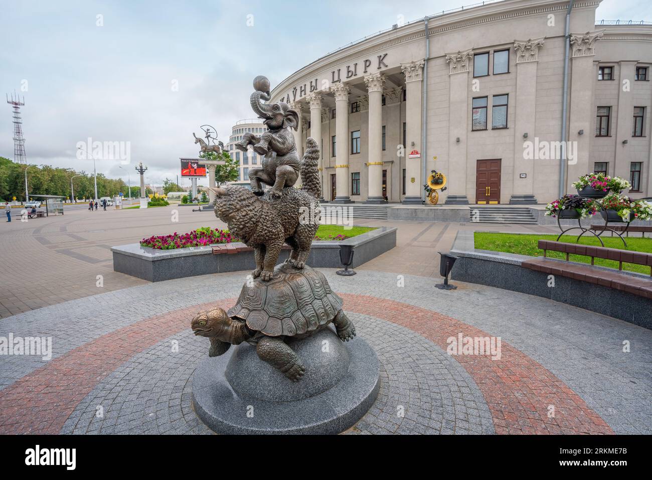 Pyramid of animals with turtle, cat and elephant Sculpture in front of ...