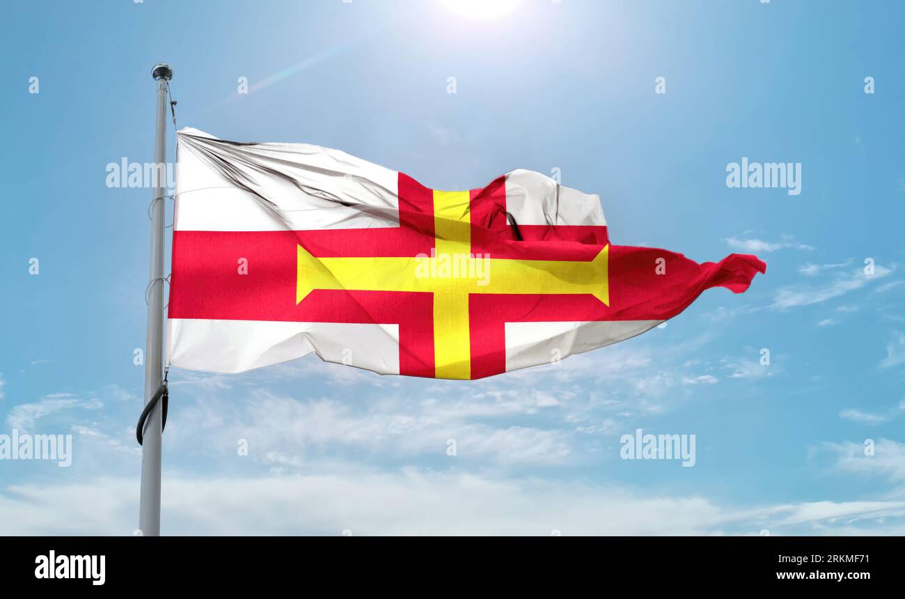 Guernsey Flag - Realistic Waving Fabric Flag Stock Photo - Alamy