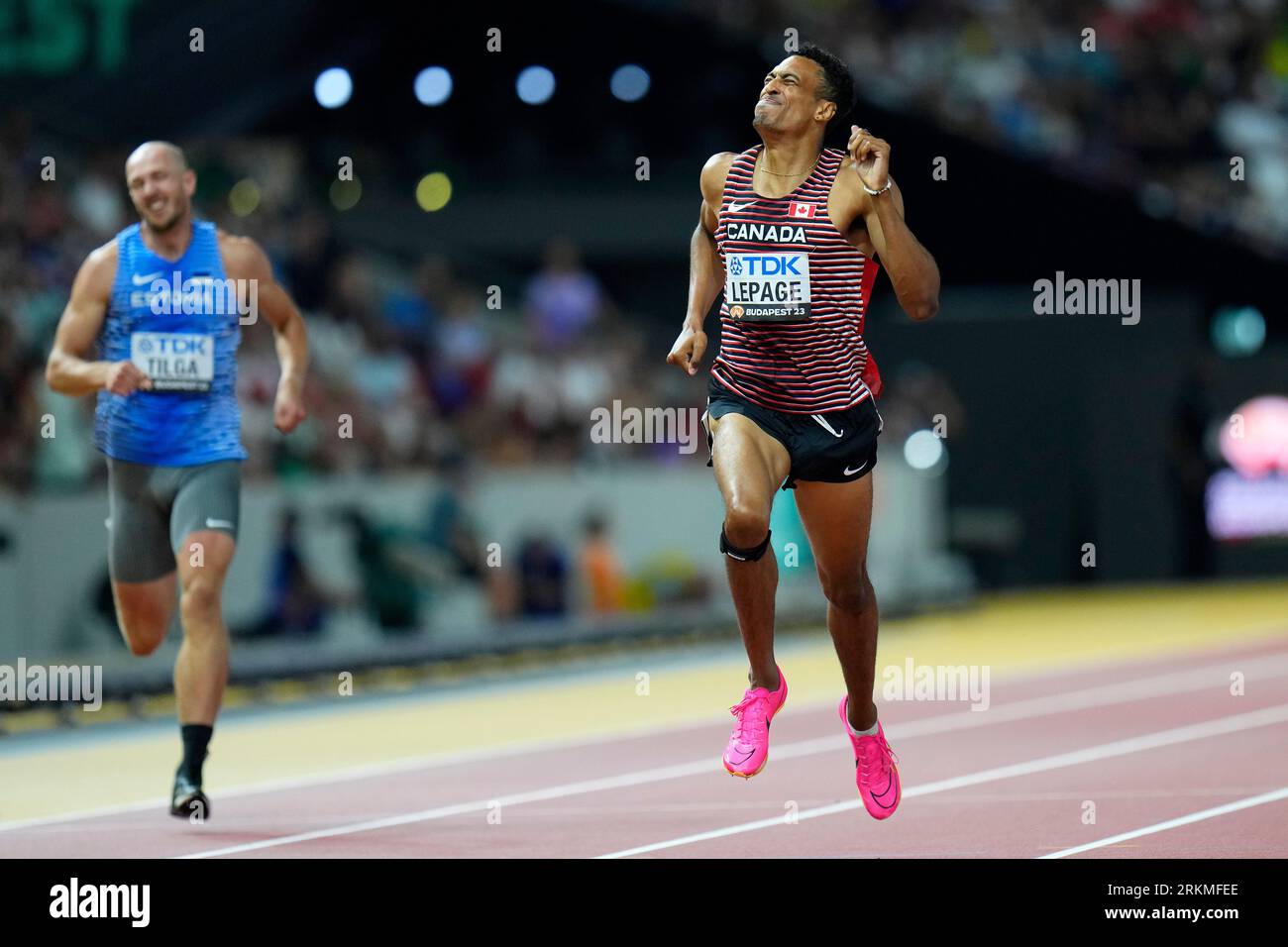 Pierce Lepage, of Canada crosses the line to win a 400-meters decathlon ...