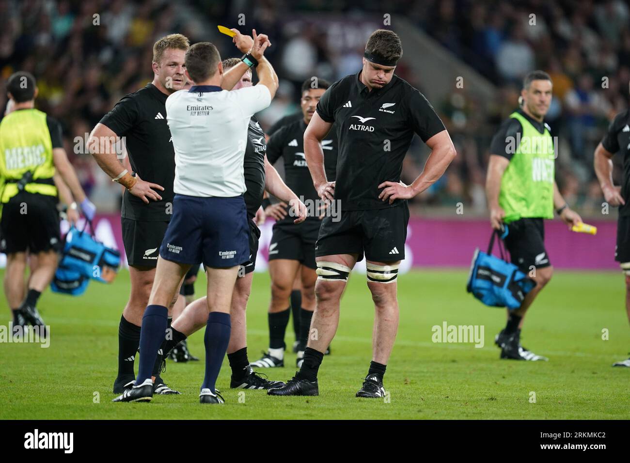 New Zealand's Scott Barrett (right) is shown a second yellow card ...