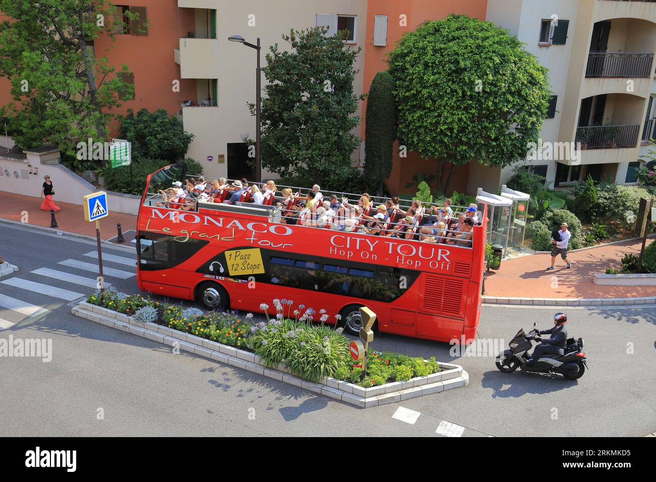 Red double-decker tourist bus on the street of Monaco Stock Photo - Alamy