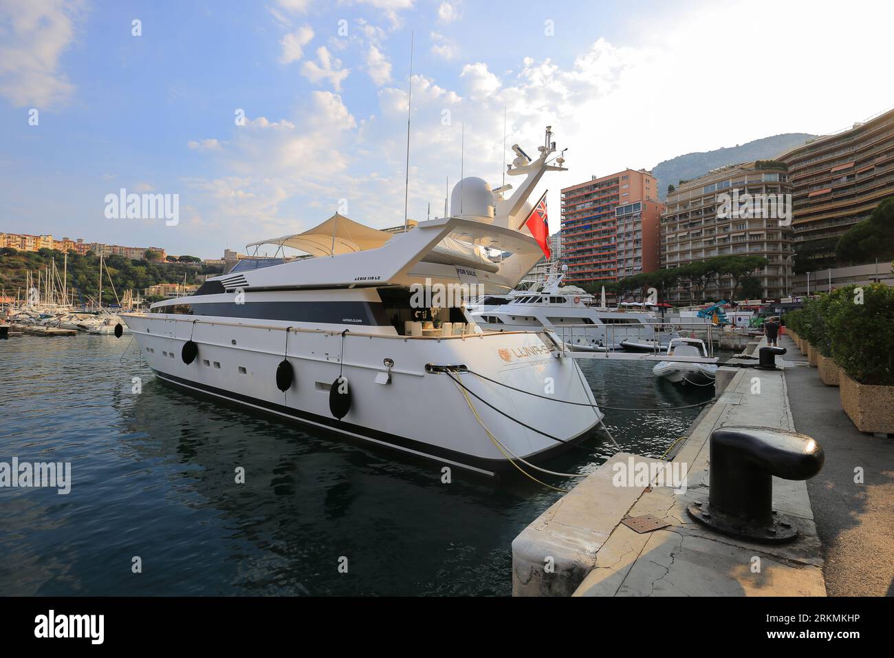 Luxury super yachts moored in the port Hercules in Monaco Stock Photo ...