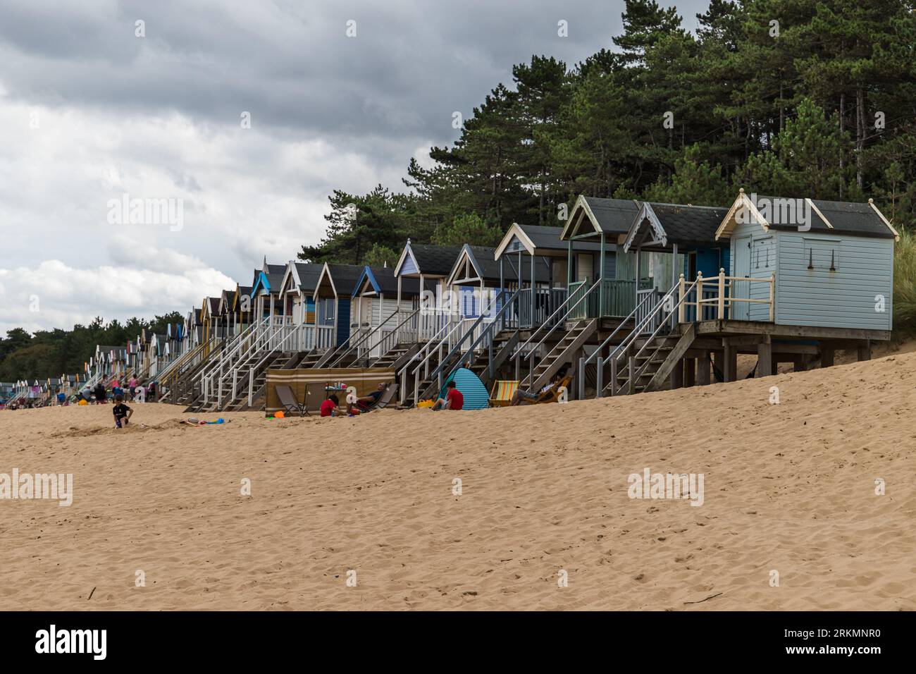Row of seaside beach huts with sea in background hi-res stock ...