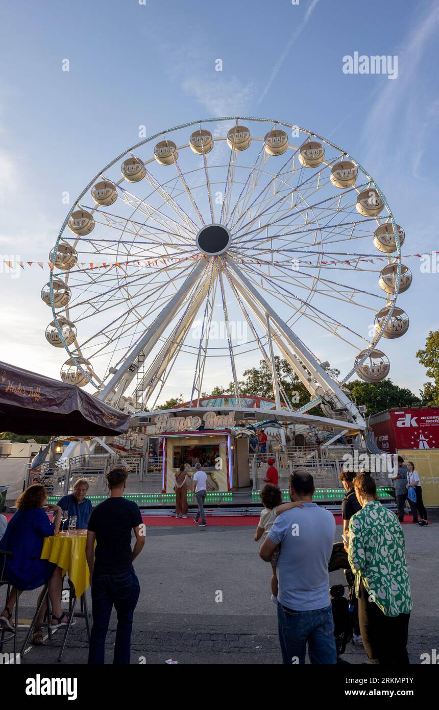 Nuremberg, Germany. 25th Aug, 2023. A Ferris wheel stands at the ...