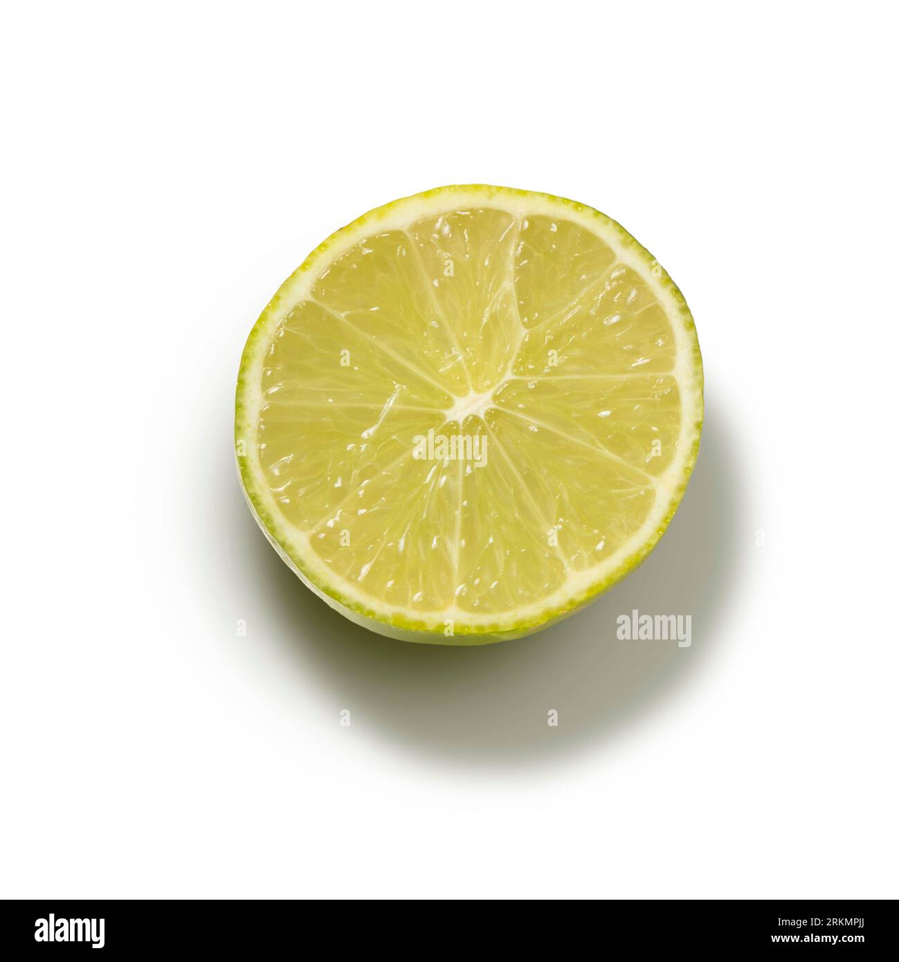 Juicy lime slice circle shape isolated on white background Stock Photo ...