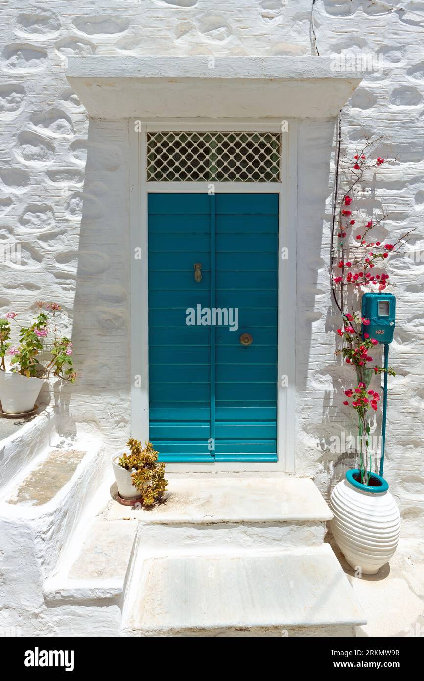 Colorful traditional house entrance of the Cyclades islands, with a ...