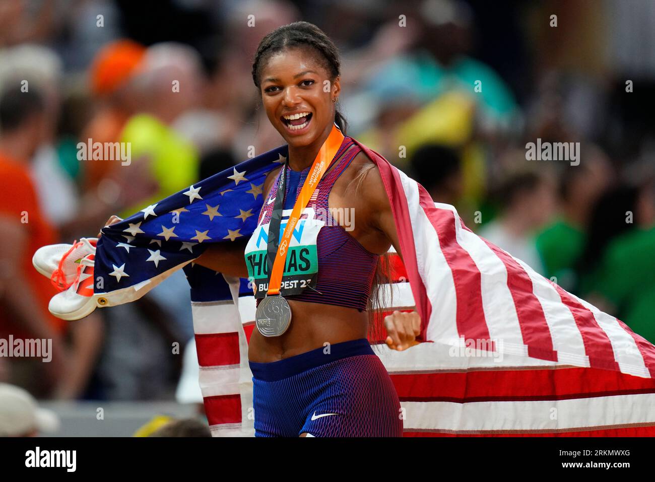 Gabrielle Thomas, of the United States, silver, reacts after the Women ...