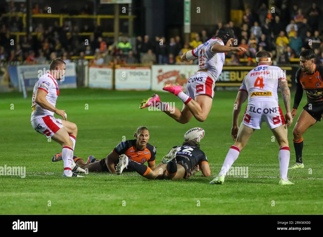 Castleford, UK. 25th Aug, 2023. Jonny Lomax of Saint Helens jumps over ...