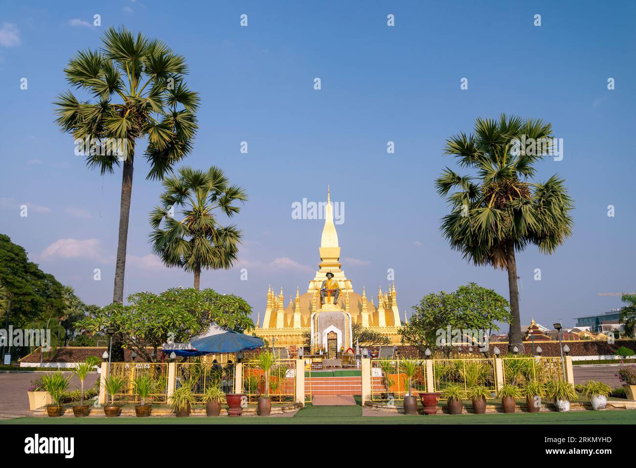 Near the entrance,statue of ancient King Setthathirat,the Stupa ...